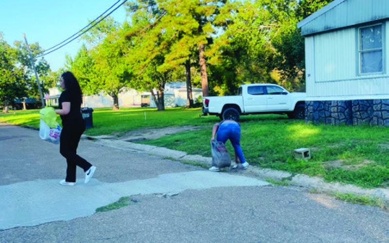 All hands on deck on Mound and Front Street | Catahoula News Booster